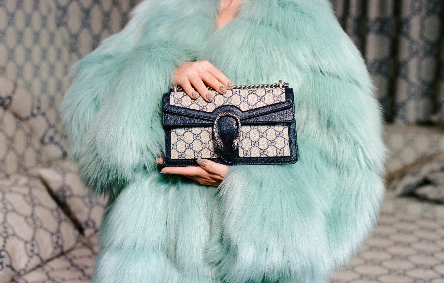 The House’s GG motif in blue takes over the scene in a new campaign ...
