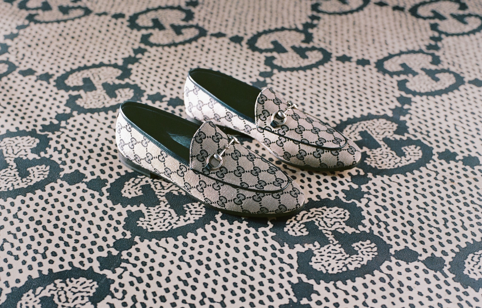 The House’s GG motif in blue takes over the scene in a new campaign ...