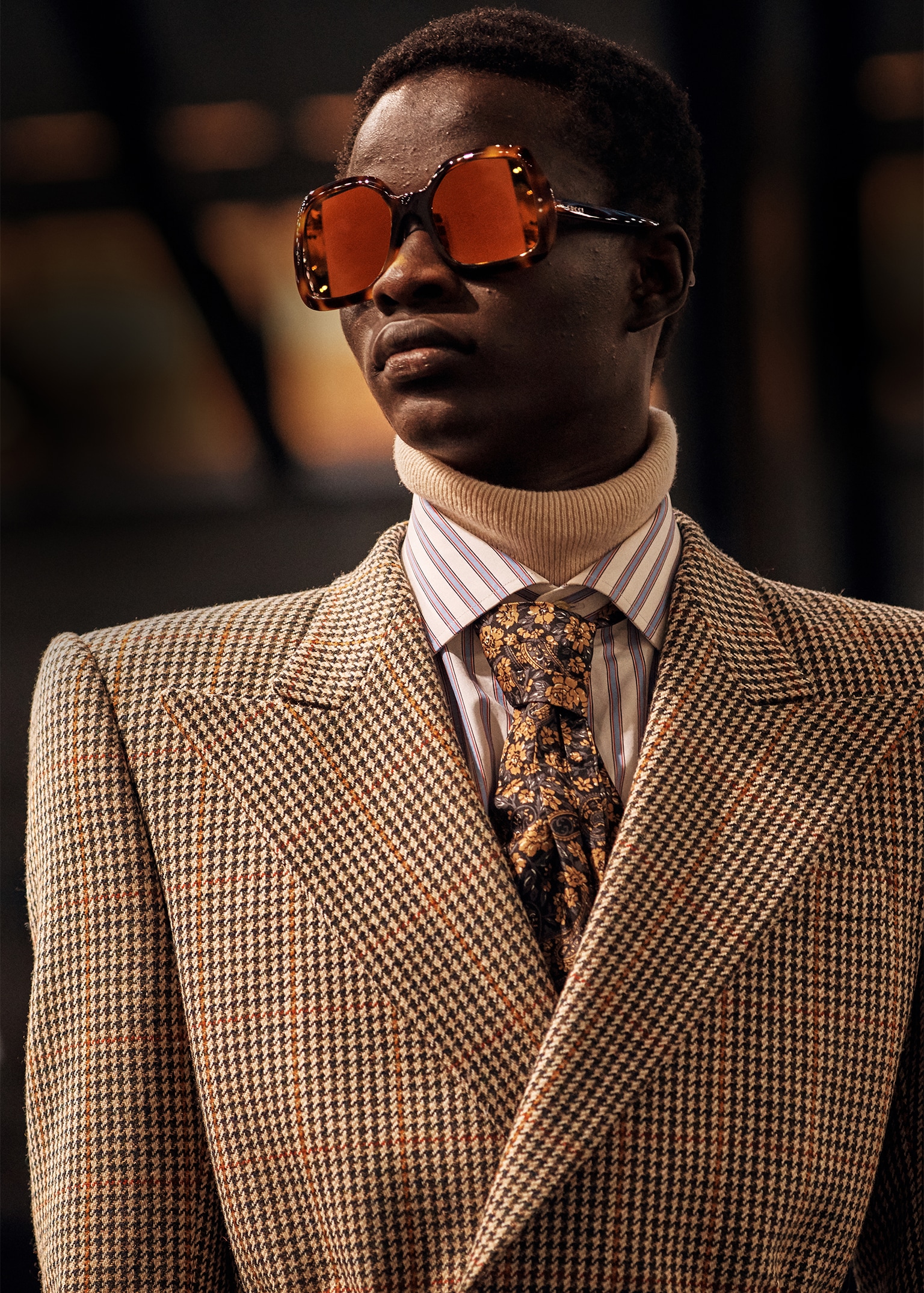 Elongated wide tailoring, the G motif on outerwear and masks—details ...