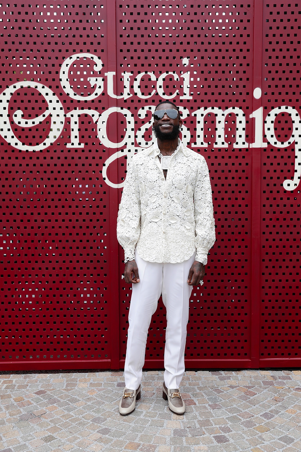 A gallery of guests attending the Spring Summer 2020 show in Milan ...