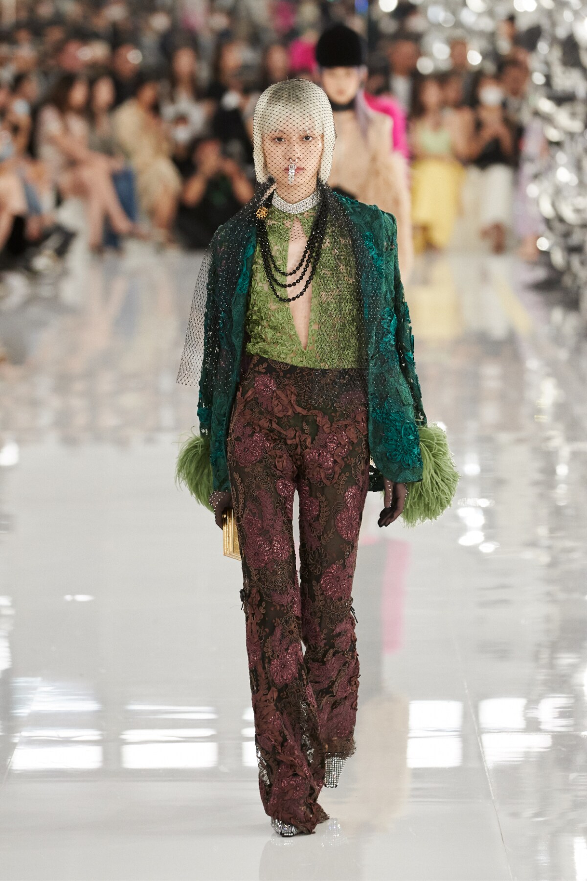 The House presented the collection in a special fashion show featuring ...