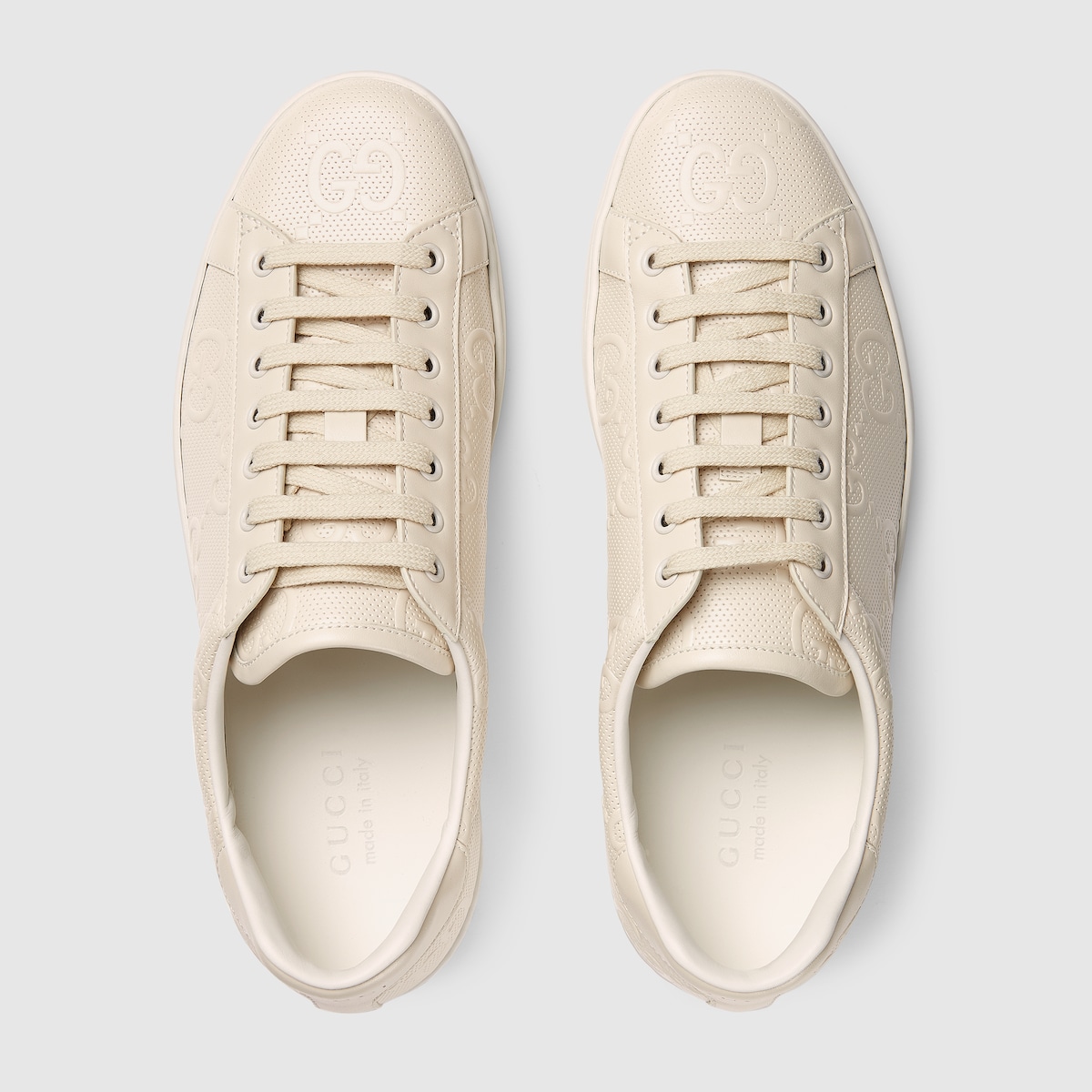 Men's Ace GG embossed sneaker in white leather | GUCCI® Australia