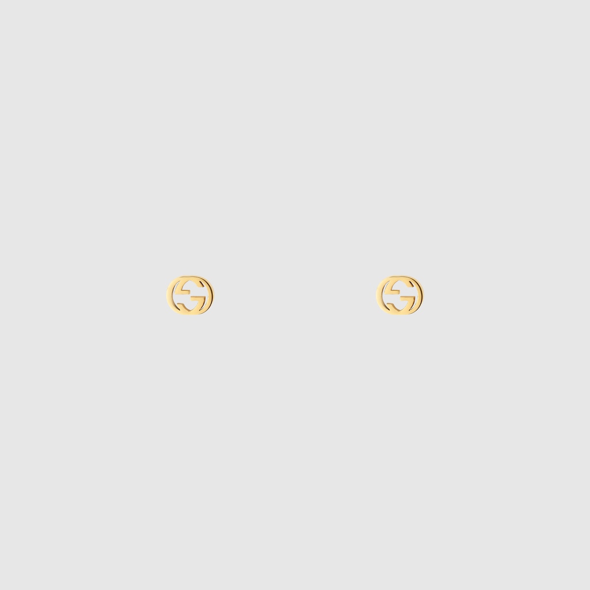 Gucci Interlocking 18k gold earrings in 18k yellow gold | GUCCI® BE