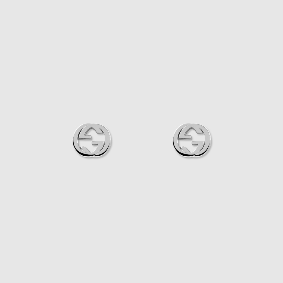 Gucci Interlocking stud earrings in 925 sterling silver | GUCCI® US