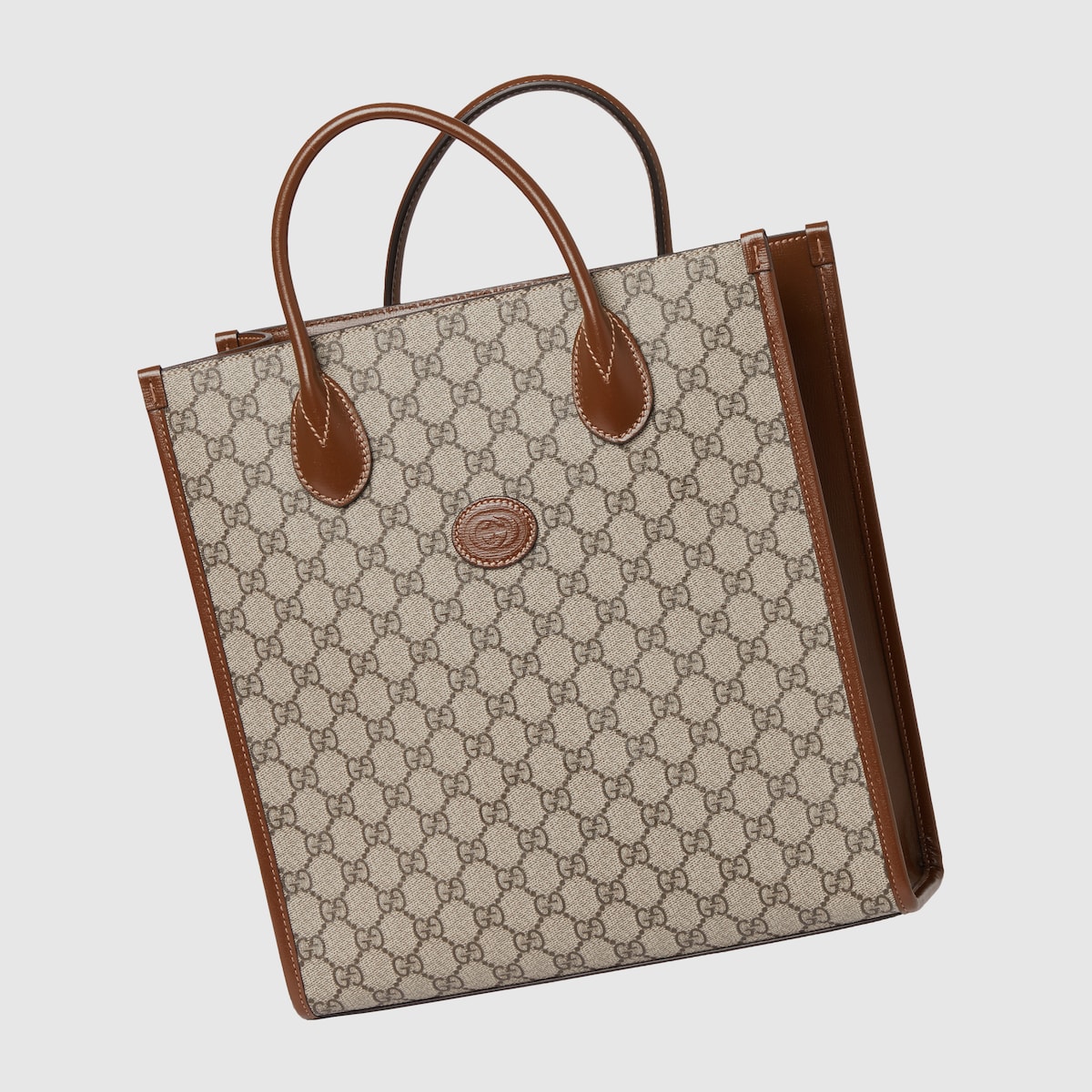 Small tote bag with Interlocking G in beige and ebony Supreme | GUCCI® UK