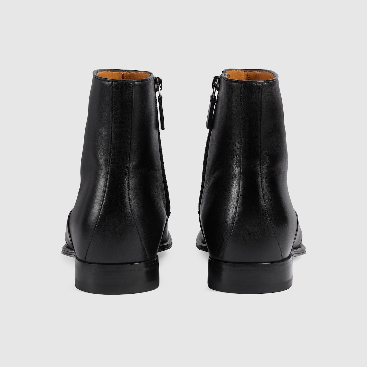 Men's bootie with Interlocking G chain in soft black leather | GUCCI® SG