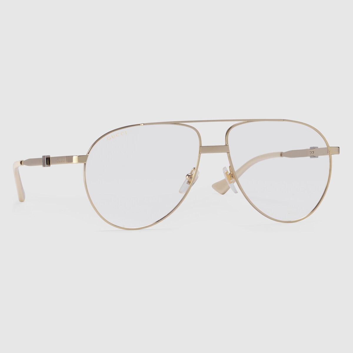 Navigator frame sunglasses in gold-toned meatal | GUCCI® SG