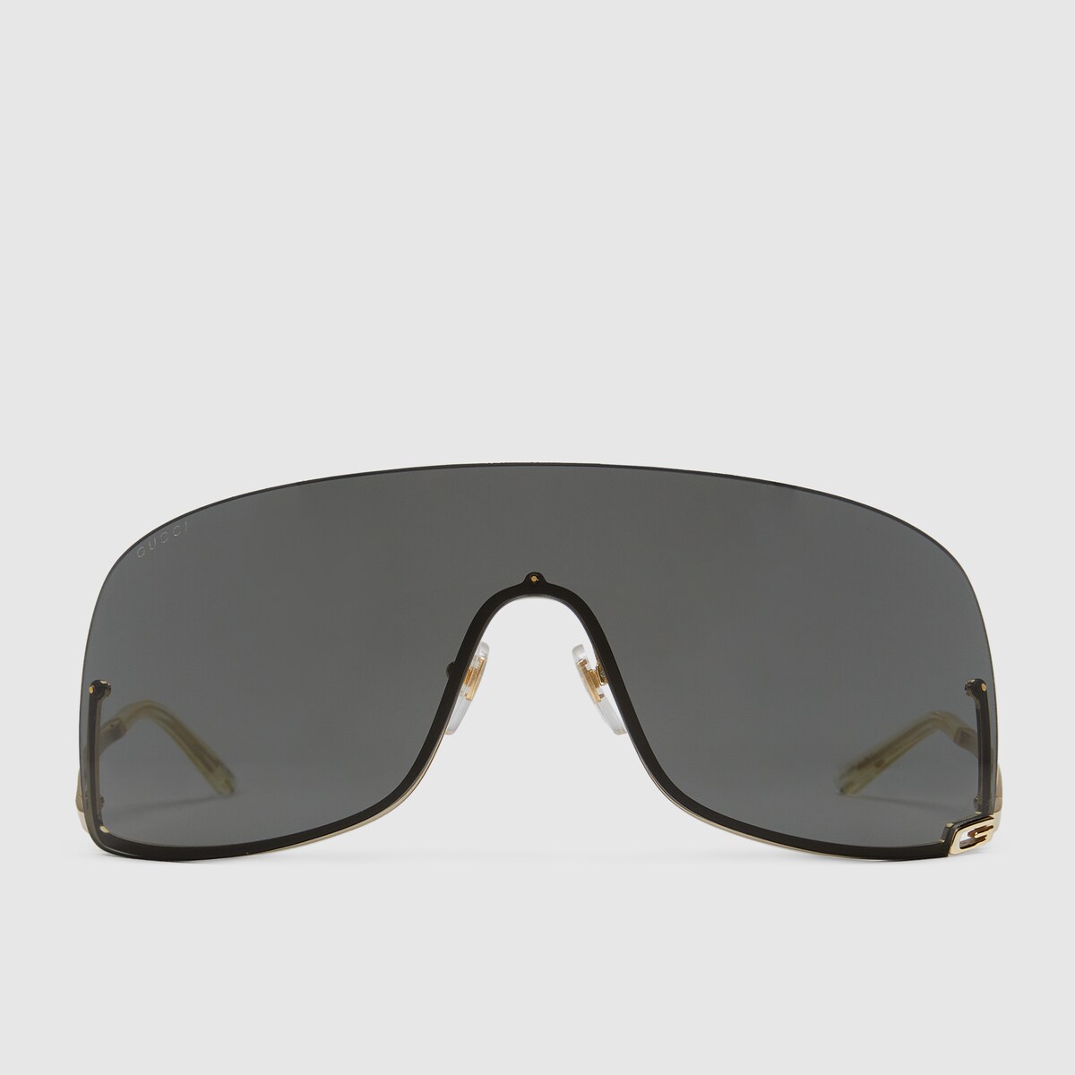 Mask-shaped frame sunglasses in gold-toned metal | GUCCI® Canada