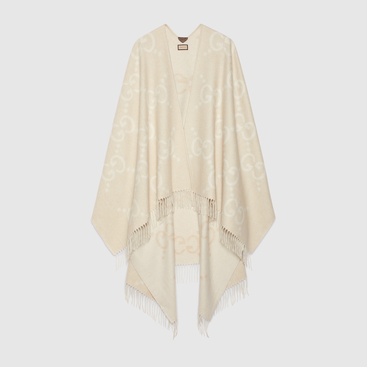 Reversible jumbo GG cashmere cape in camel and white | GUCCI® US