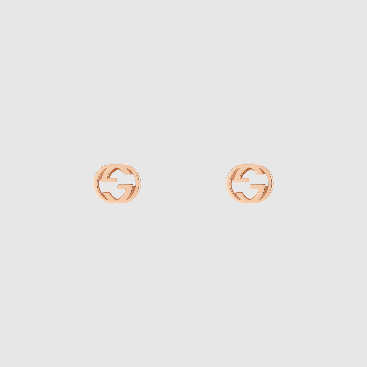 Gucci Interlocking stud earrings in 18k rose gold | GUCCI® US