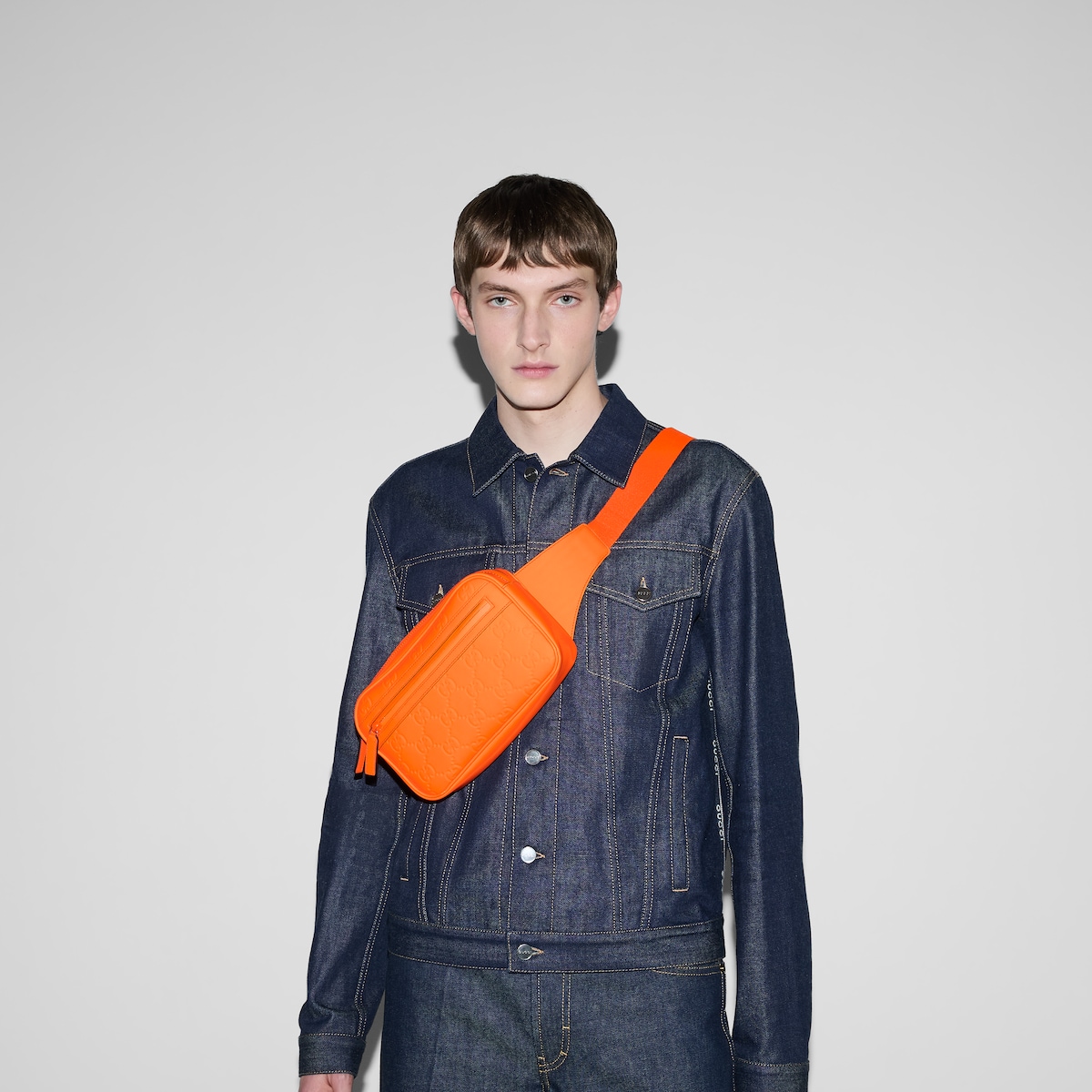GG rubber-effect belt bag in orange rubber-effect leather | GUCCI ...