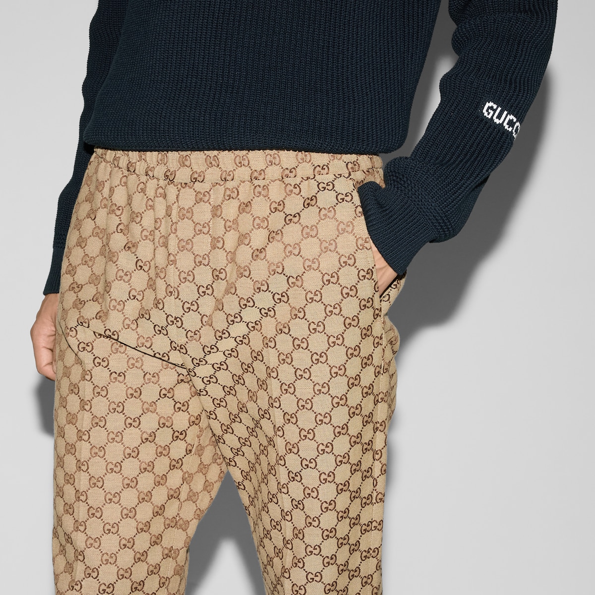 GG canvas track bottoms in camel and ebony | GUCCI® TR