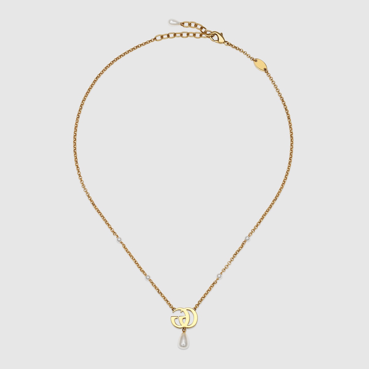 GG Marmont pendant necklace in yellow gold-toned metal | GUCCI® Canada