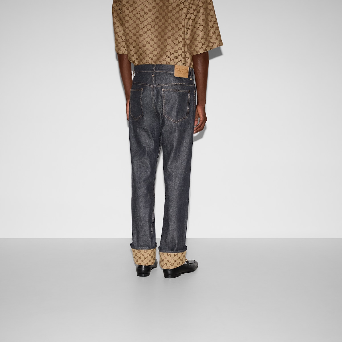 กางเกง Denim pant with cuffs inสีน้ำเงินเข้ม | GUCCI® TH