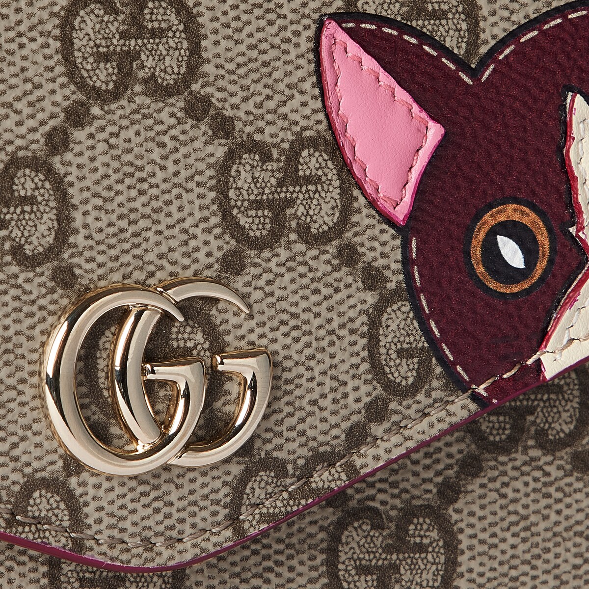 GG mini shoulder bag with cat detail in beige and dark brown fabric ...