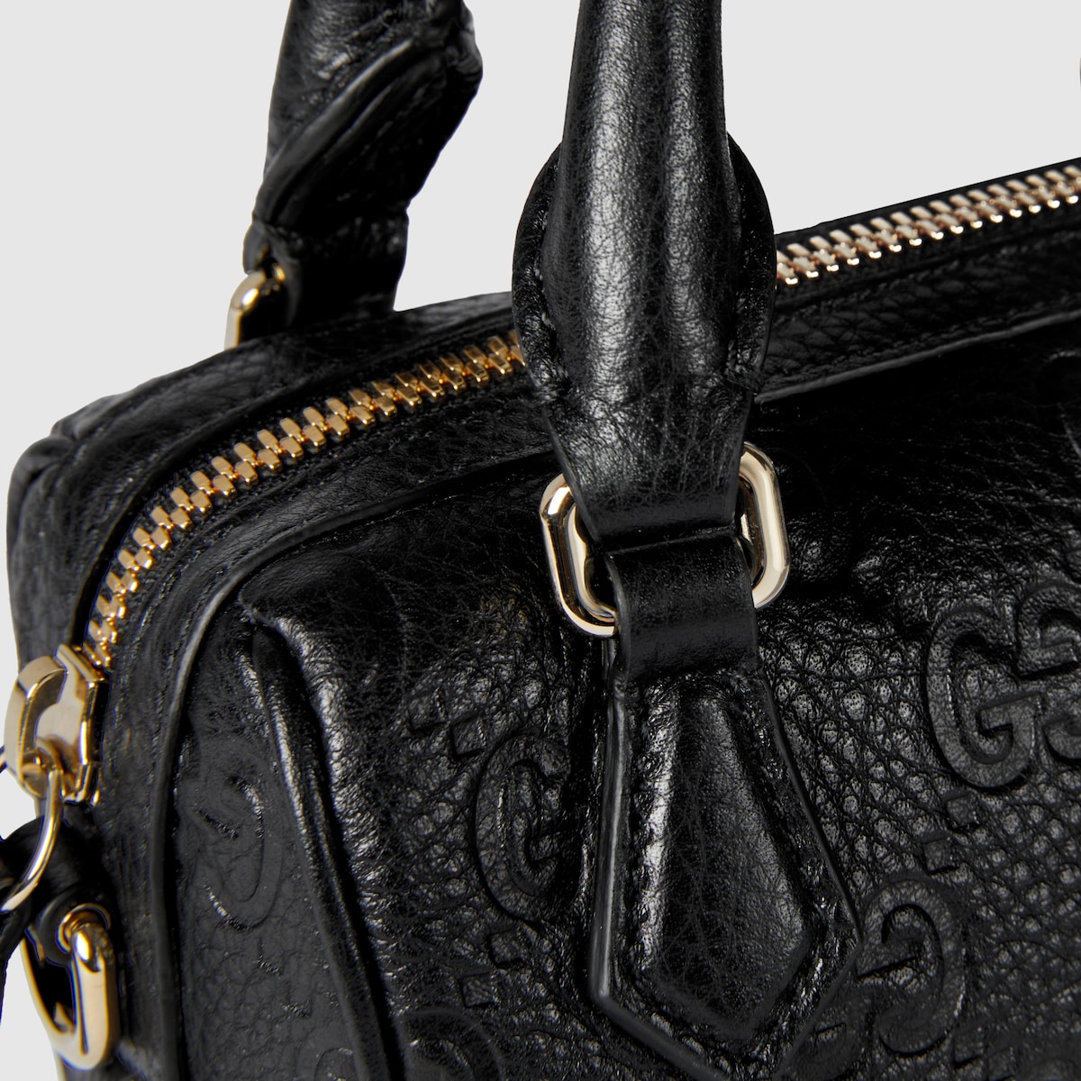 GG Emblem mini boston bag in black leather | GUCCI® UK
