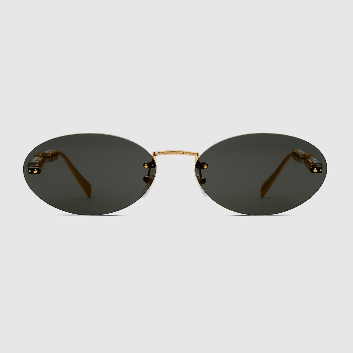 Oval frame sunglasses in gold-toned | GUCCI® US
