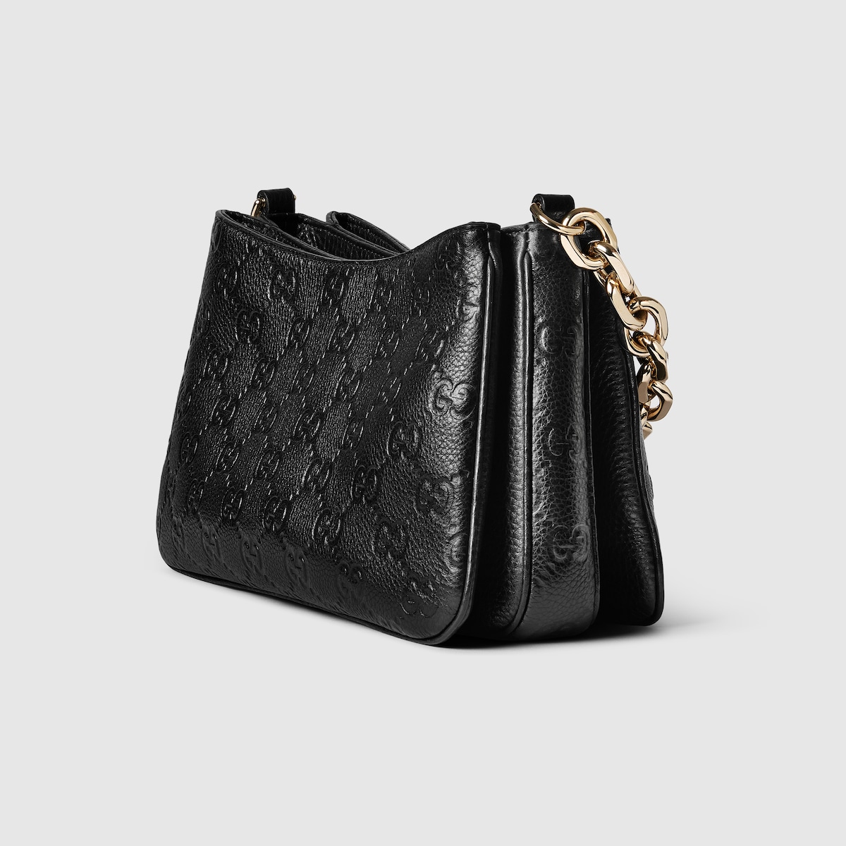 GG Emblem small shoulder bag in black leather | GUCCI® TH