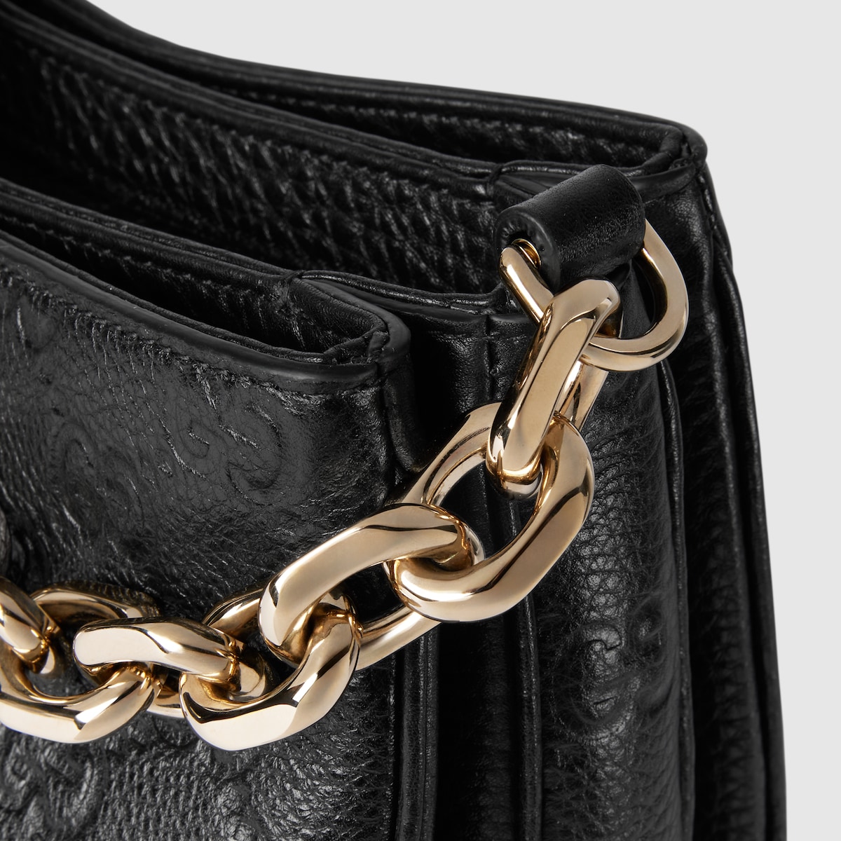 GG Emblem small shoulder bag in black leather | GUCCI® DK