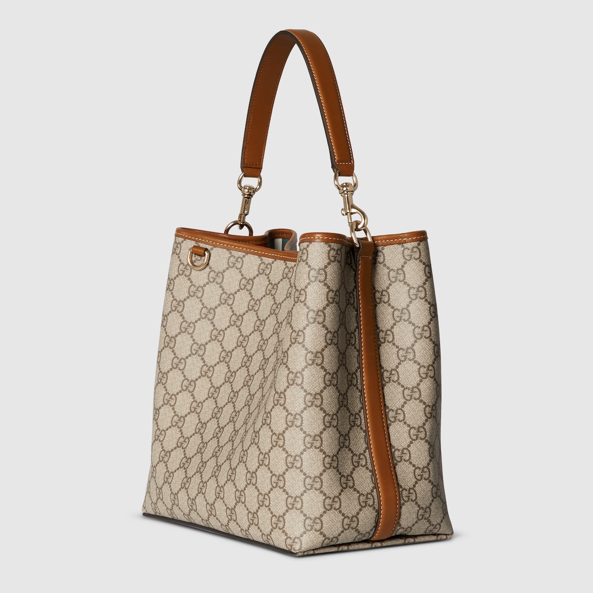 GG Emblem medium bucket bag in beige and dark brown fabric | GUCCI® GR