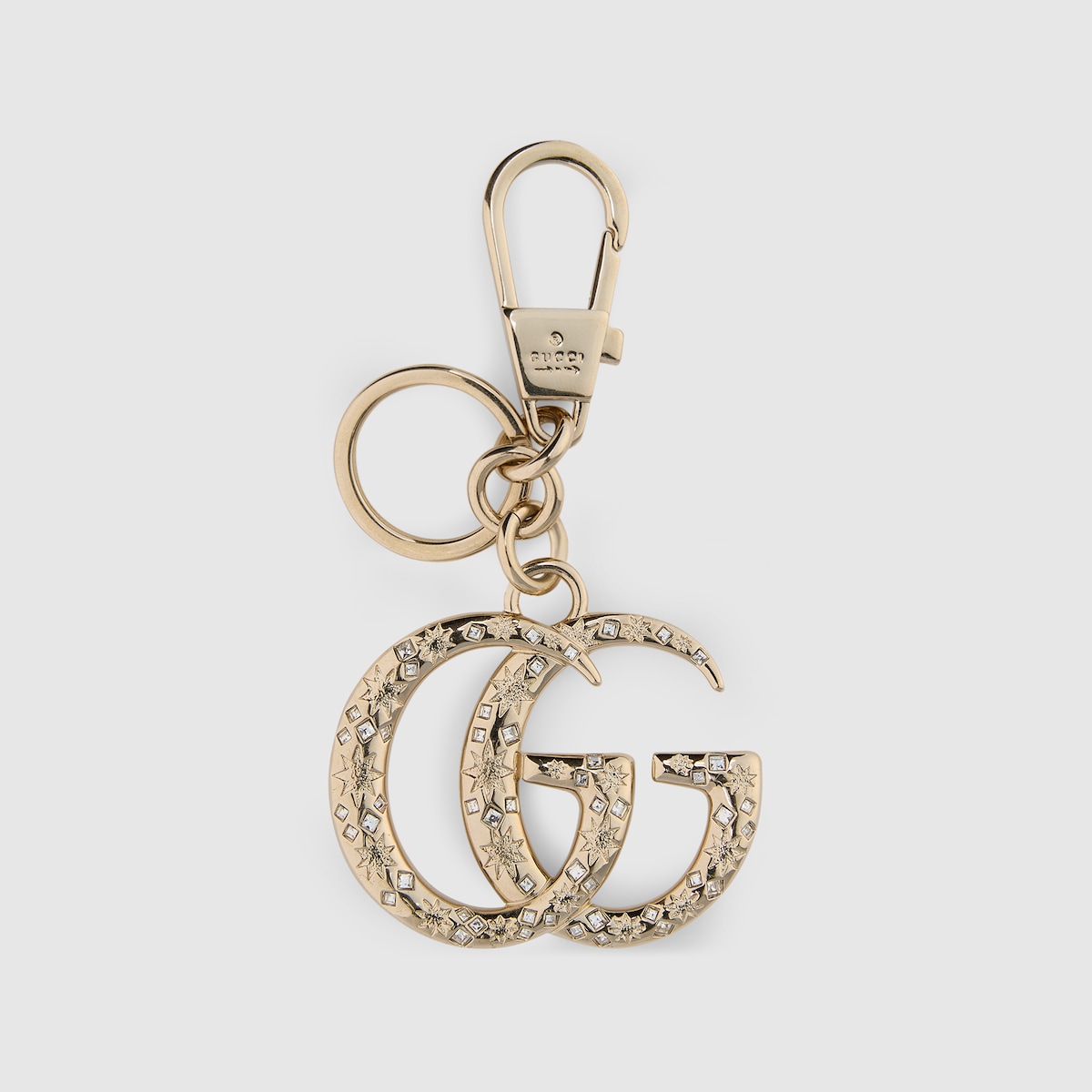 Crystal Double G keychain in light gold-toned metal | GUCCI® CA