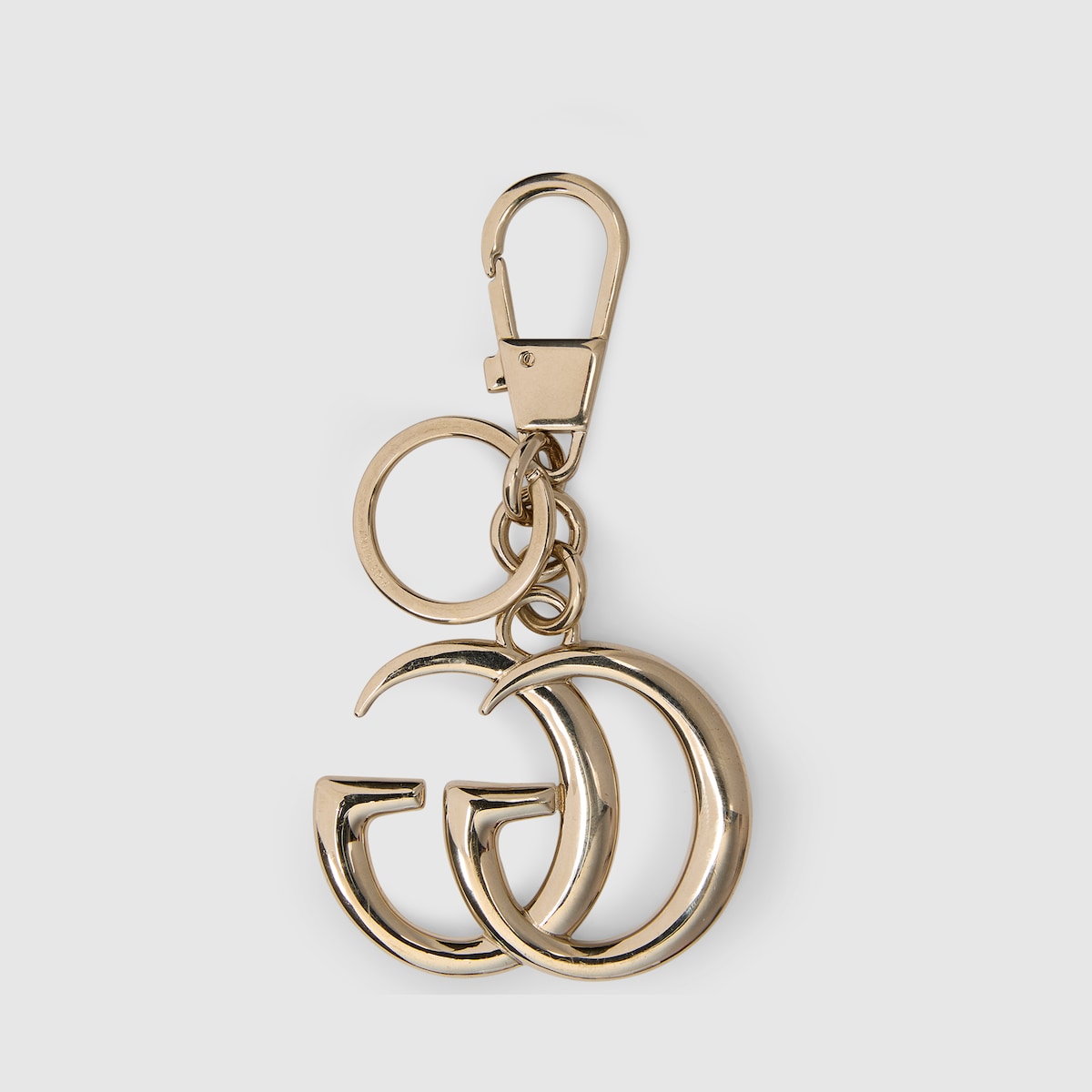 Crystal Double G keychain in light gold-toned metal | GUCCI® CA
