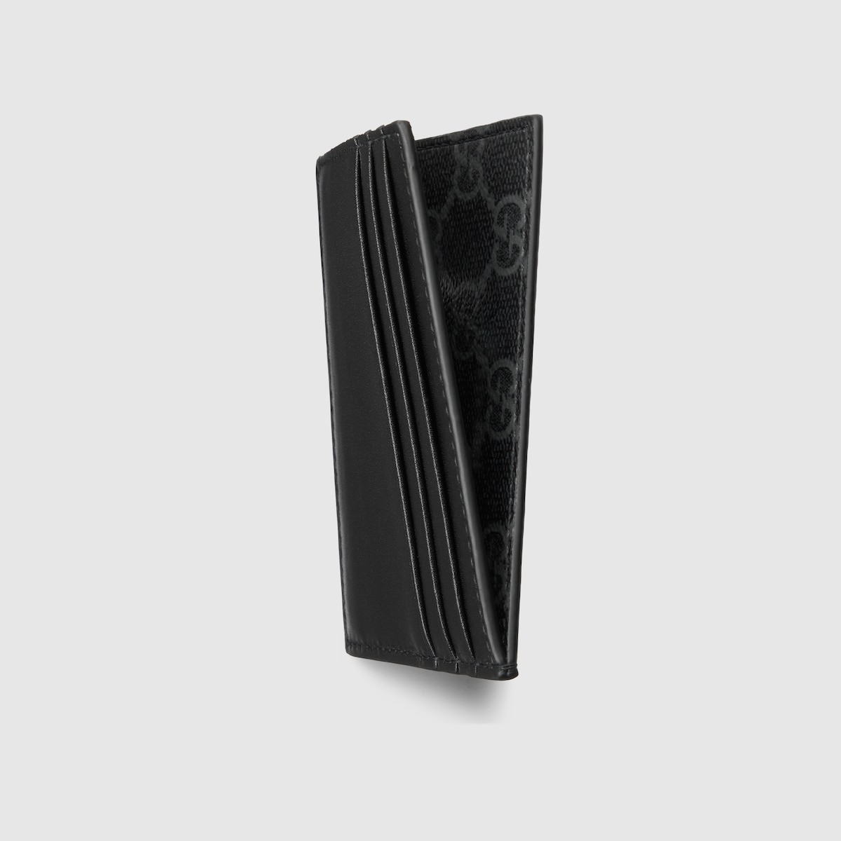 GG Emblem embossed card case in black leather | GUCCI® NZ