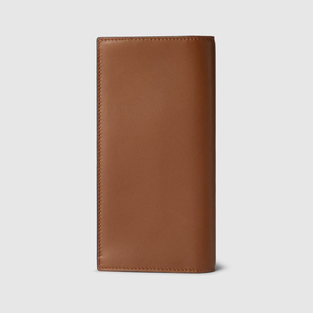 GG Emblem long embossed wallet in brown leather | GUCCI® NZ