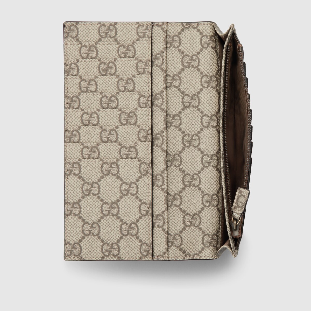 GG Emblem long embossed wallet in brown leather | GUCCI® Australia