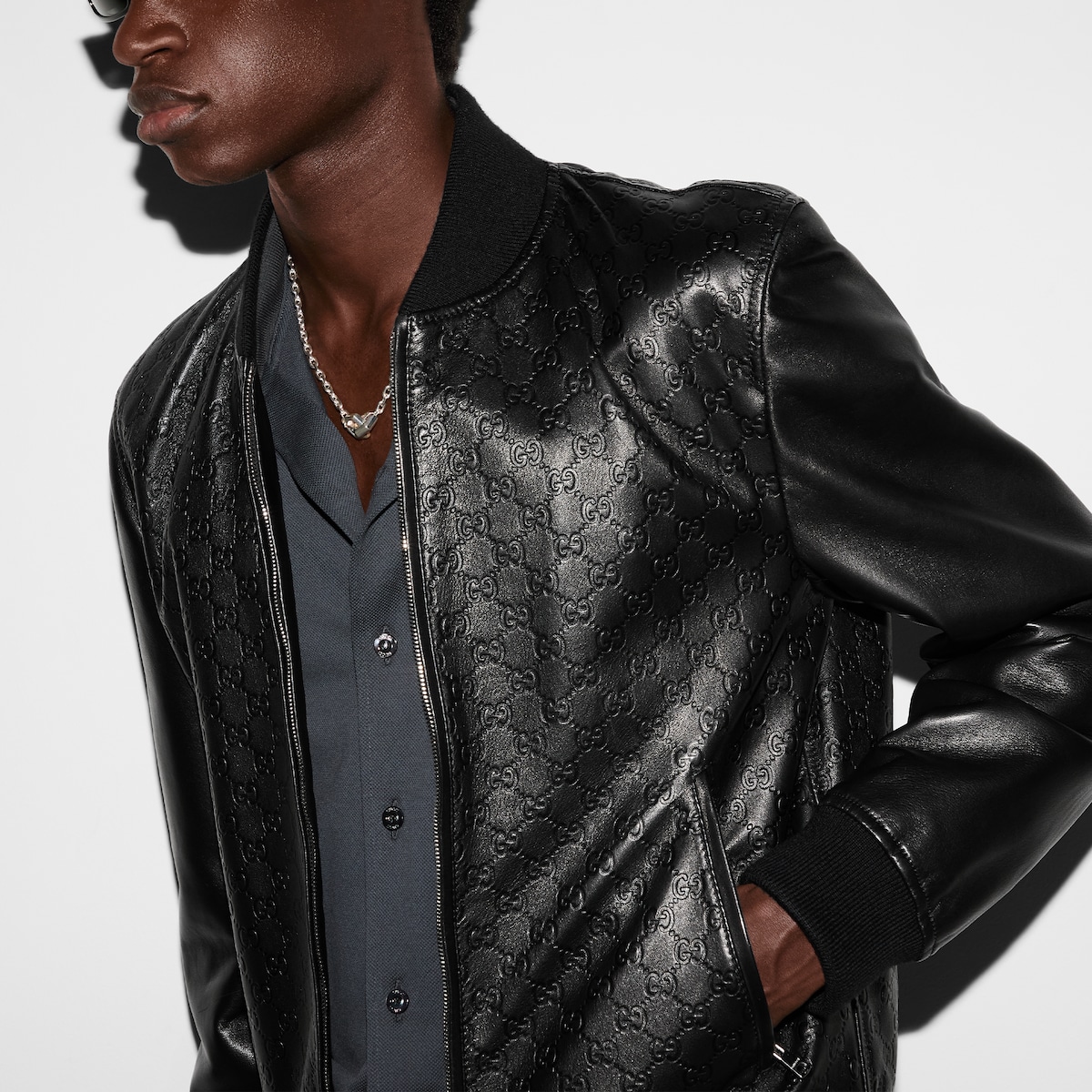 Embossed GG leather bomber jacket in black | GUCCI® UK