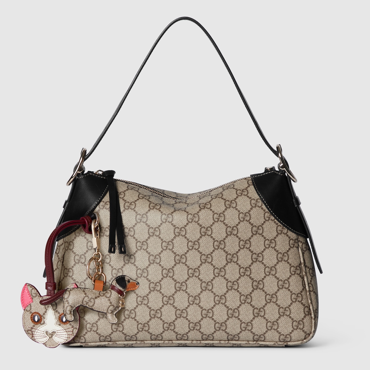 GG Emblem medium shoulder bag in beige and dark brown fabric | GUCCI® CA