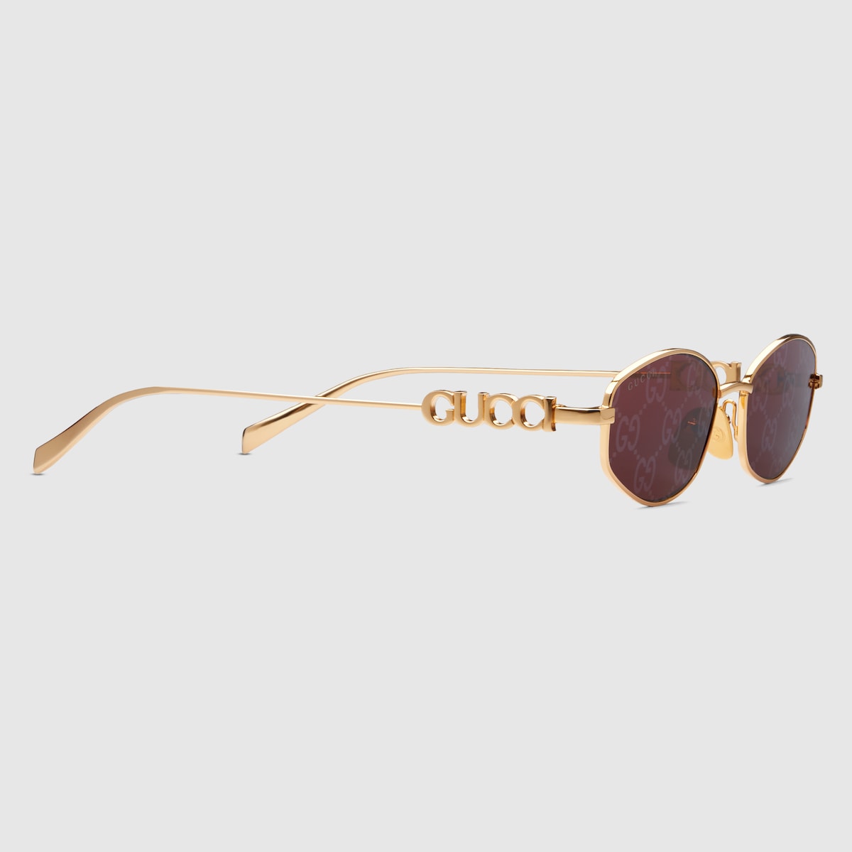 Oval frame sunglasses in gold-toned | GUCCI® UK