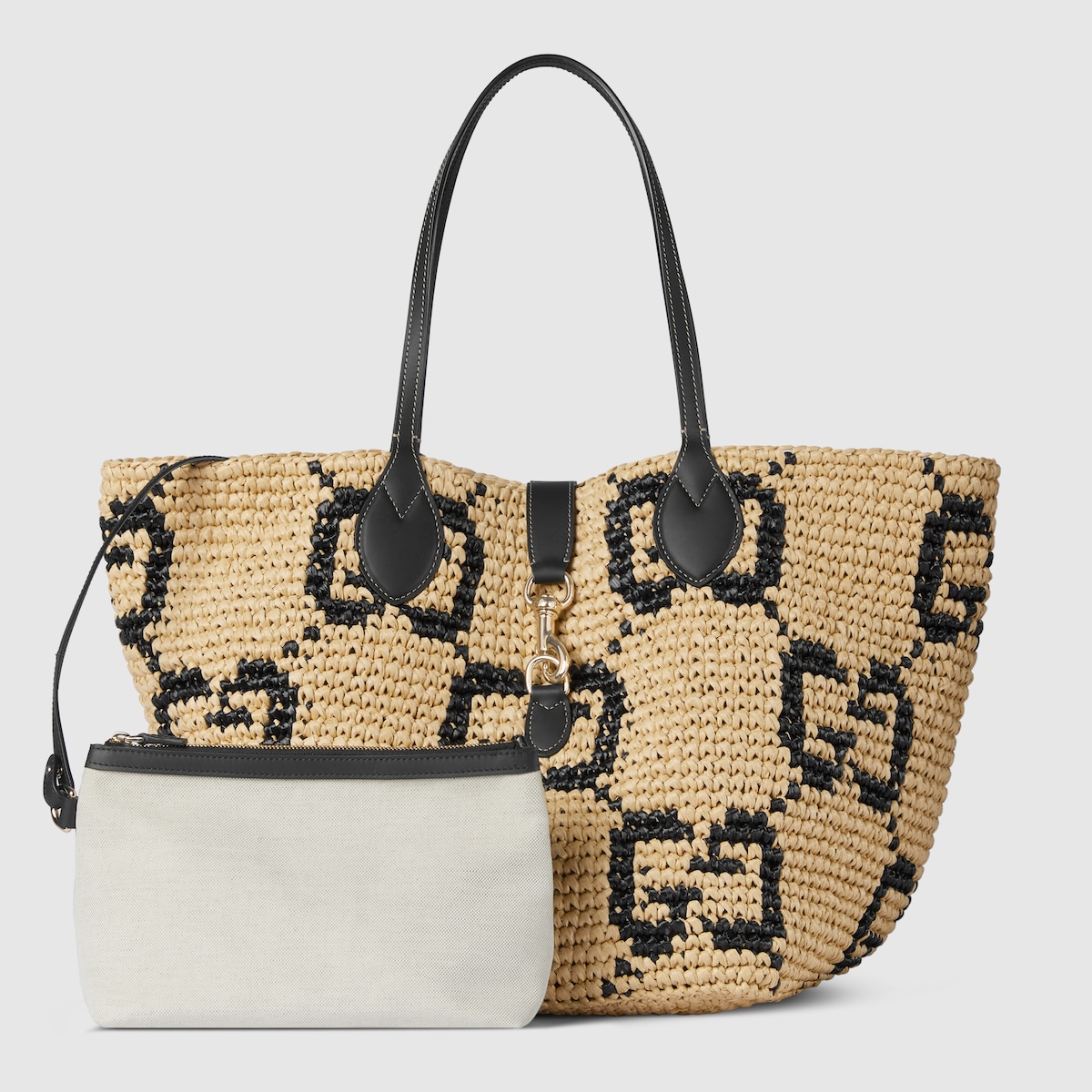 กระเป๋า Medium raffia-effect tote bag inผ้าสีธรรมชาติและสีดำ | GUCCI® TH