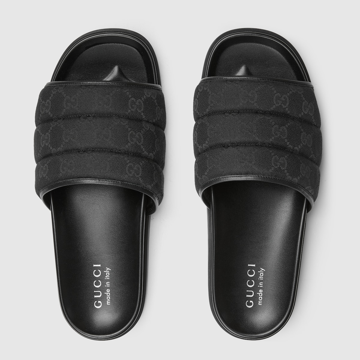 Men's slide sandal in black padded GG canvas | GUCCI® US