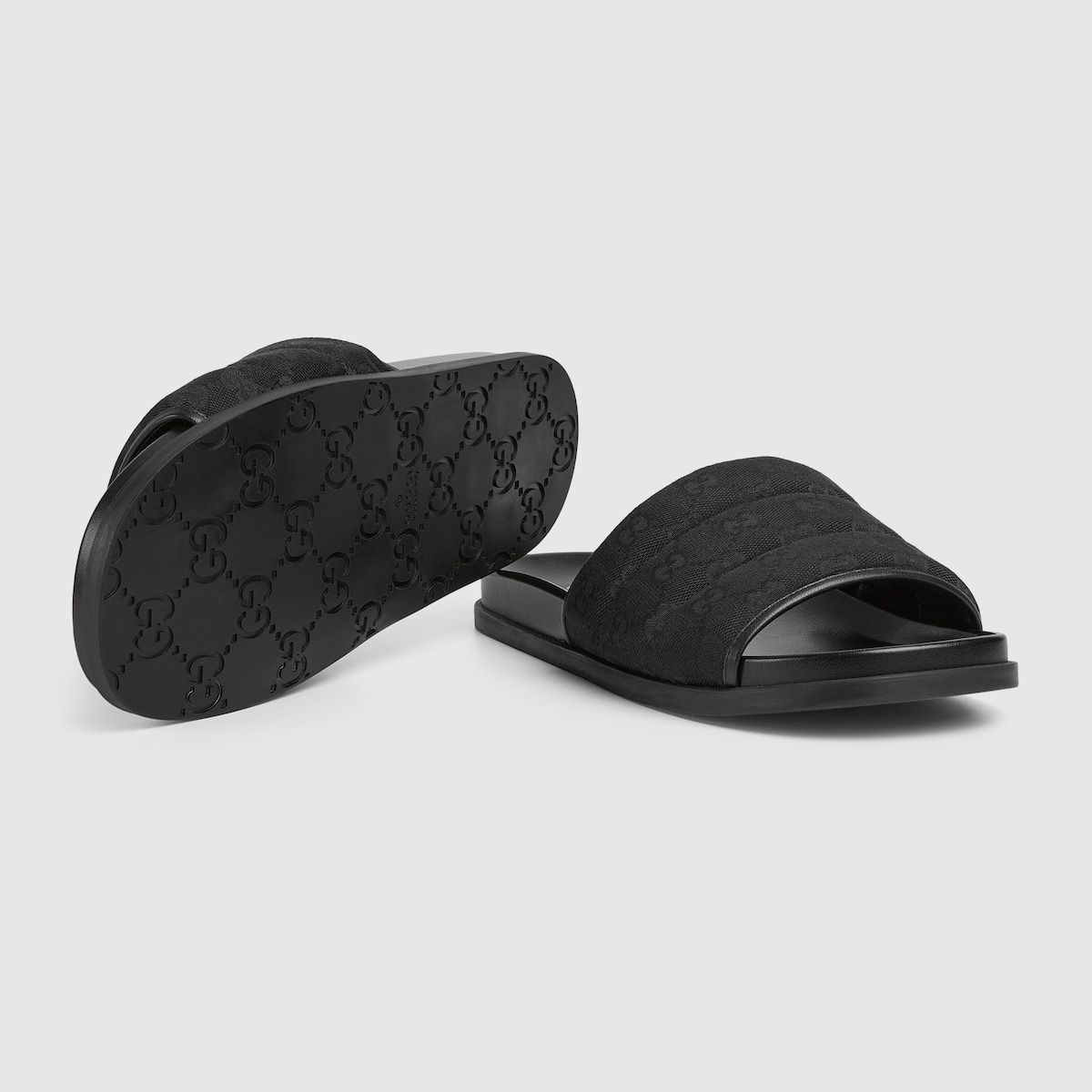 Men's slide sandal in black padded GG canvas | GUCCI® US