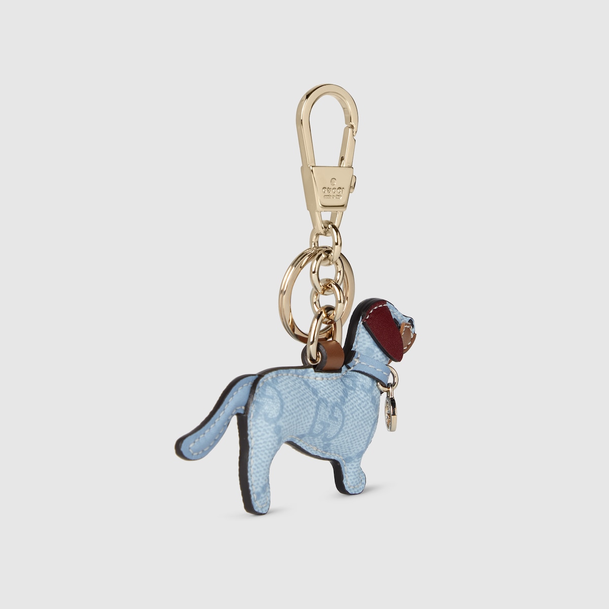 Dog-shaped bag charm in light blue GG Supreme | GUCCI® US