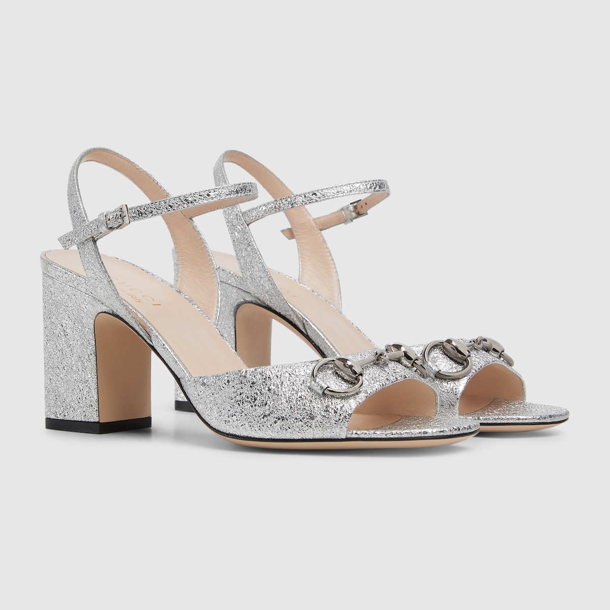 Women's mid-heel sandal with Horsebit in silver metallic leather ...
