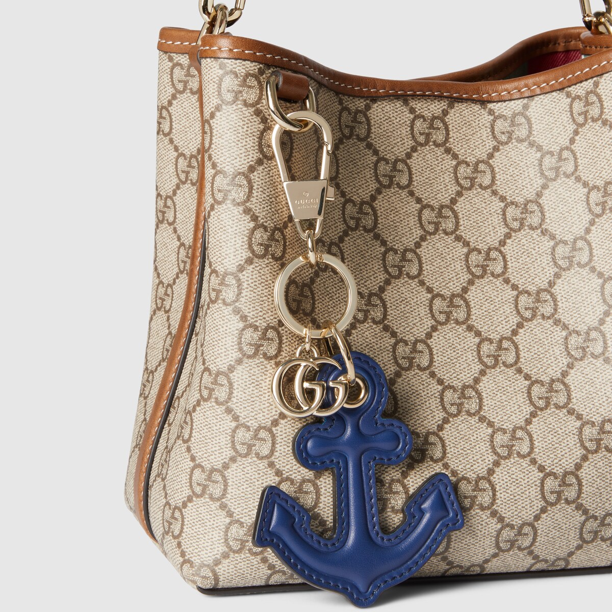 Keychain with anchor detail in dark blue leather | GUCCI® US