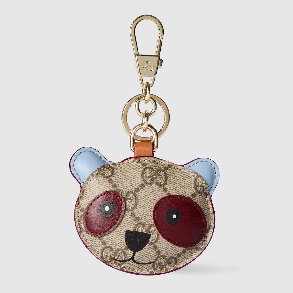 Panda-shaped bag charm in beige and dark brown canvas | GUCCI® PT