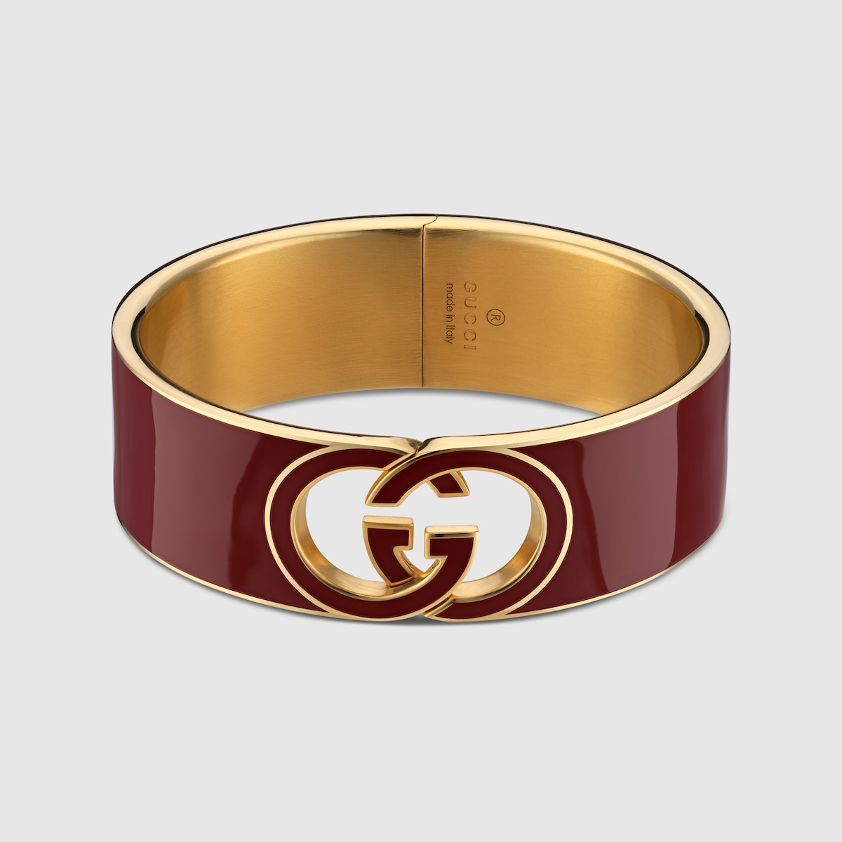 Gucci Interlocking enamel cuff bracelet in yellow gold-toned brass ...