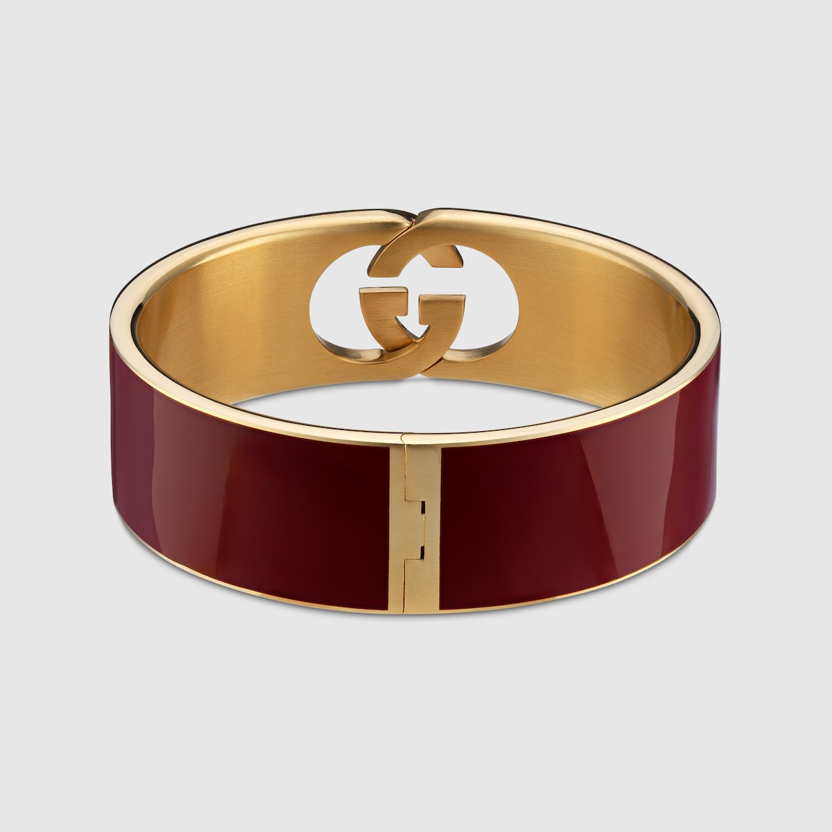 Gucci Interlocking enamel cuff bracelet in yellow gold-toned brass ...