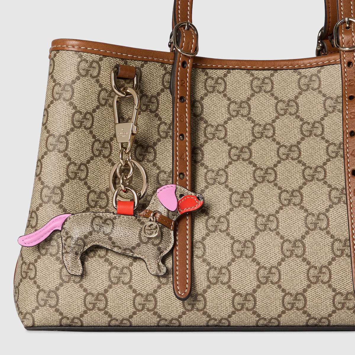 Dog-shaped bag charm in beige and brown GG fabric | GUCCI® US