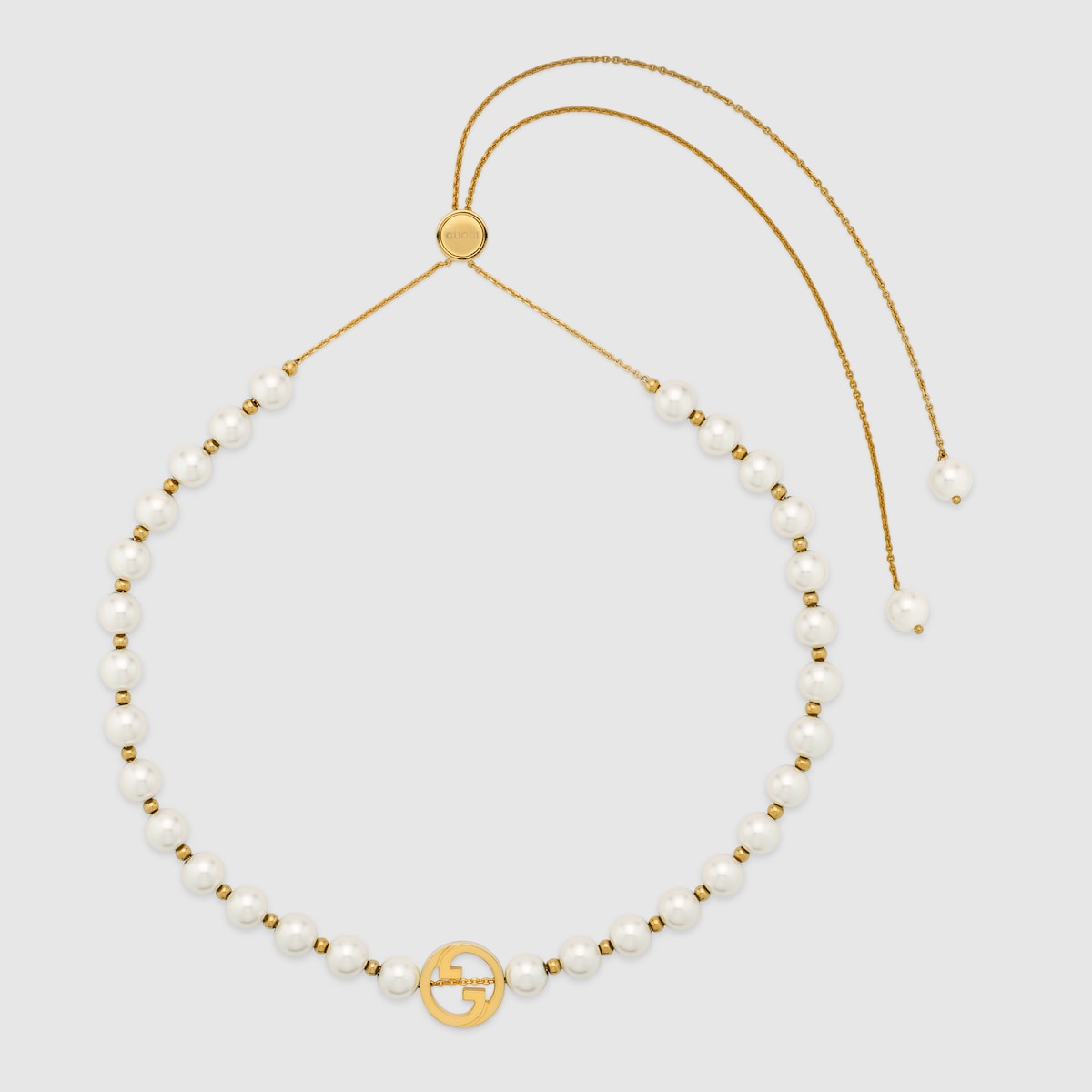 Gucci Interlocking pearl necklace in light gold-toned brass | GUCCI® US