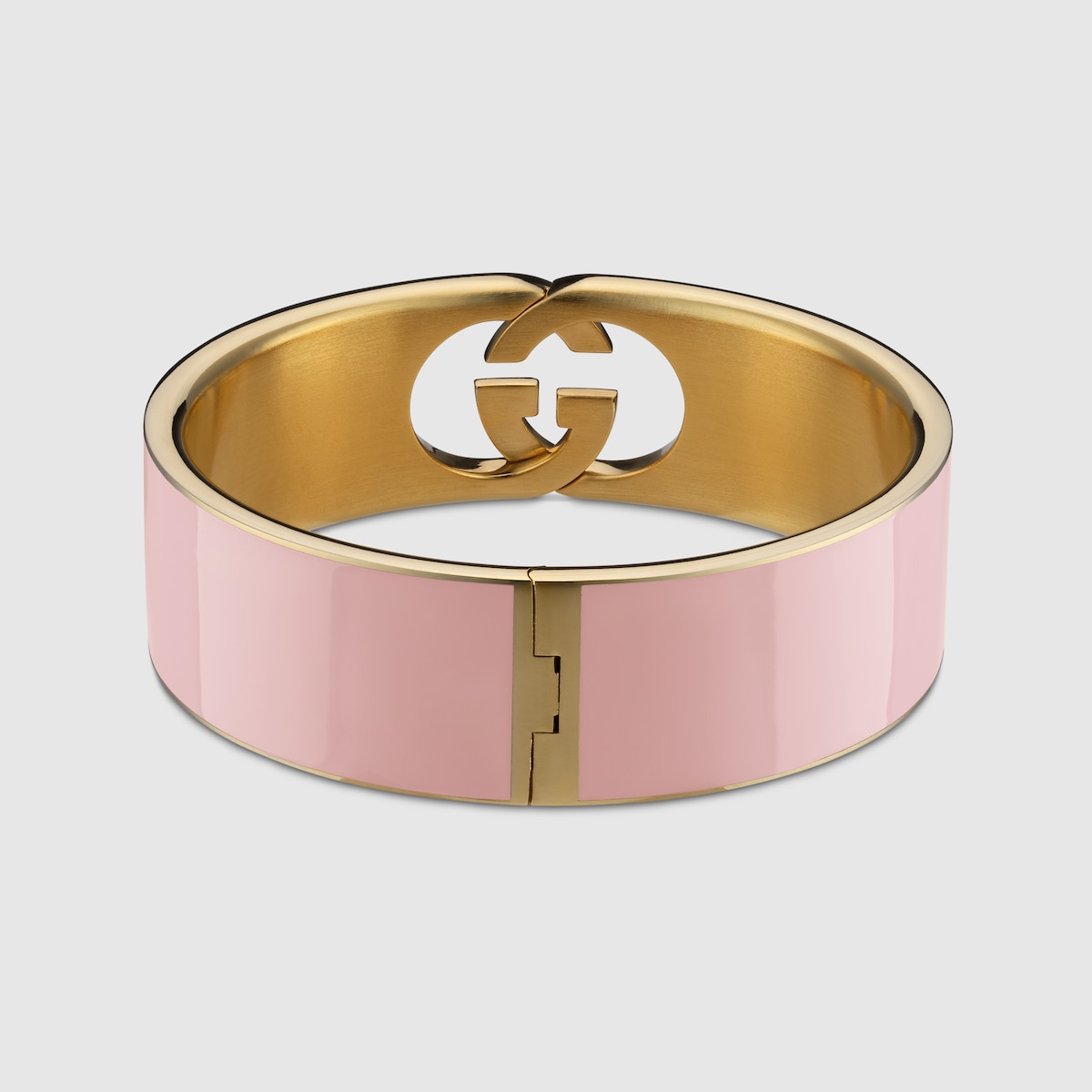 Gucci Interlocking enamel cuff bracelet in yellow gold-toned brass ...