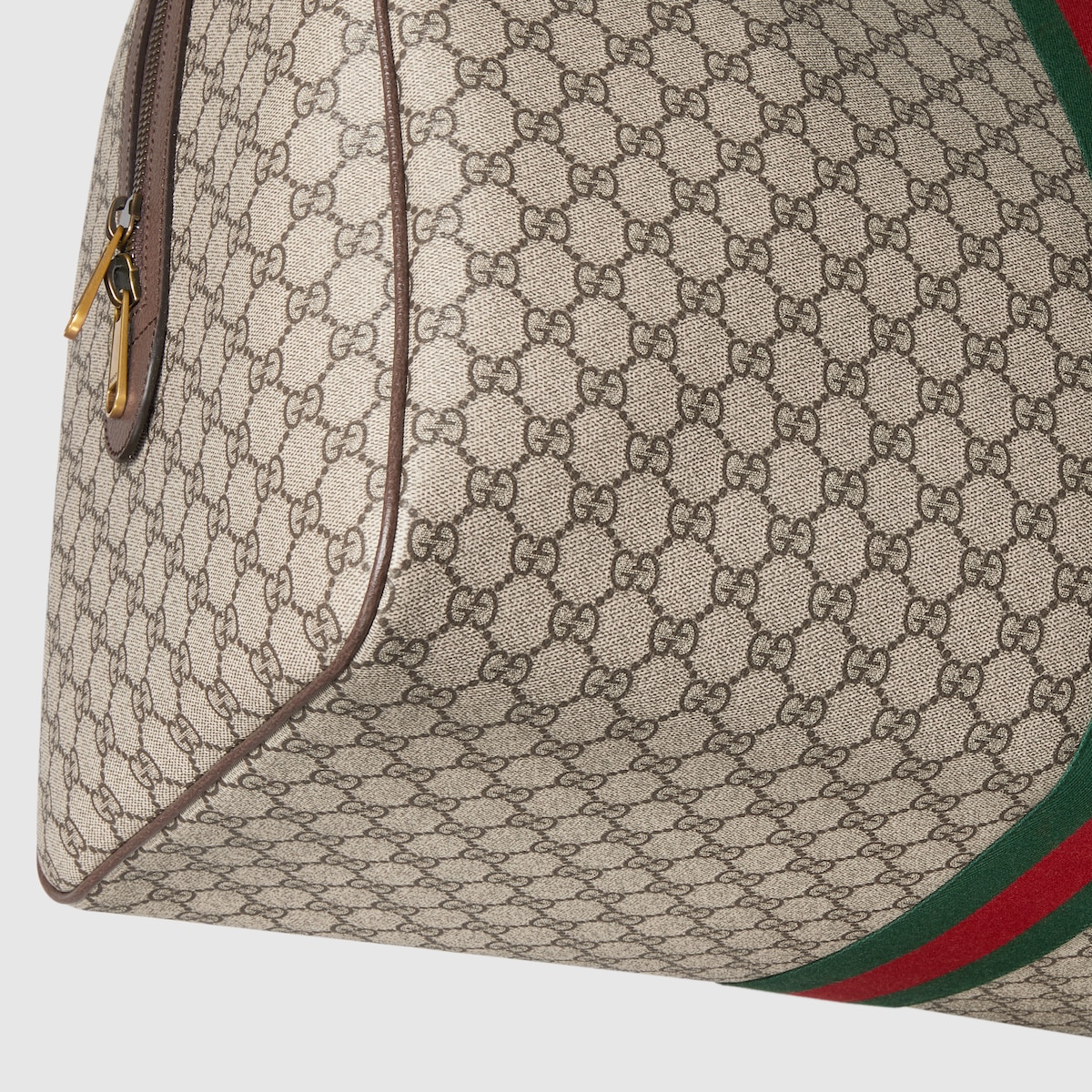 Gucci Savoy large duffle bag in beige and dark brown fabric | GUCCI® UK