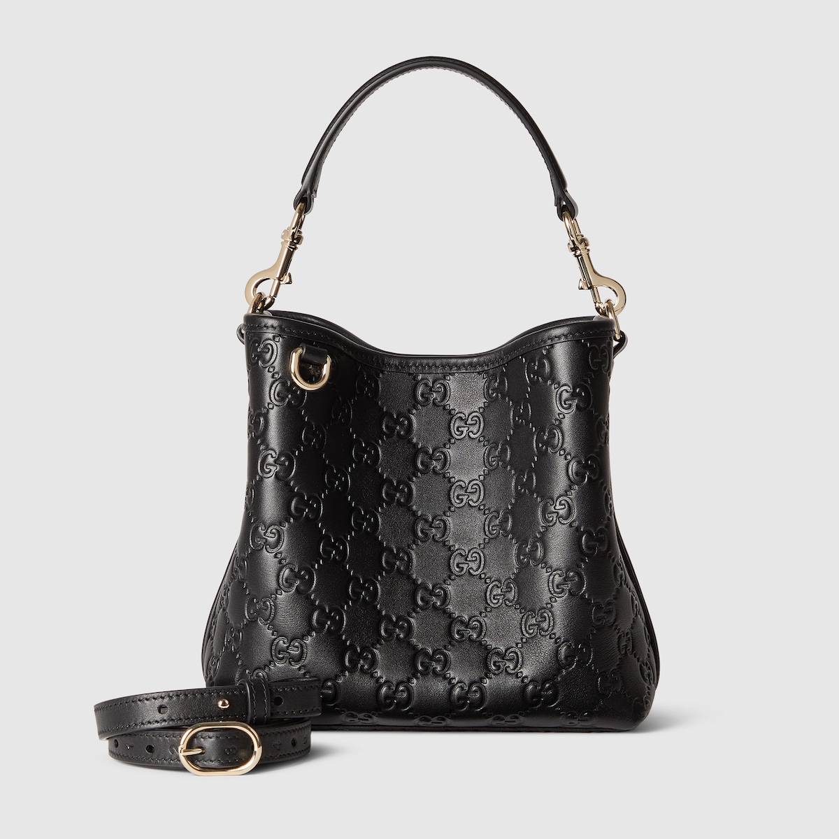 GG Emblem small bucket bag in black GG leather | GUCCI® UK