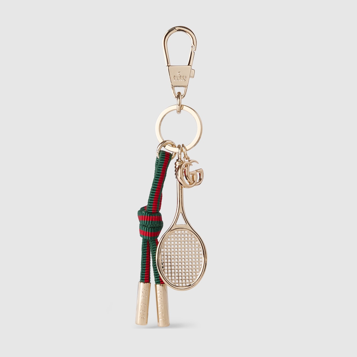 Gucci Tennis keychain with Web in light gold-toned metal | GUCCI® US