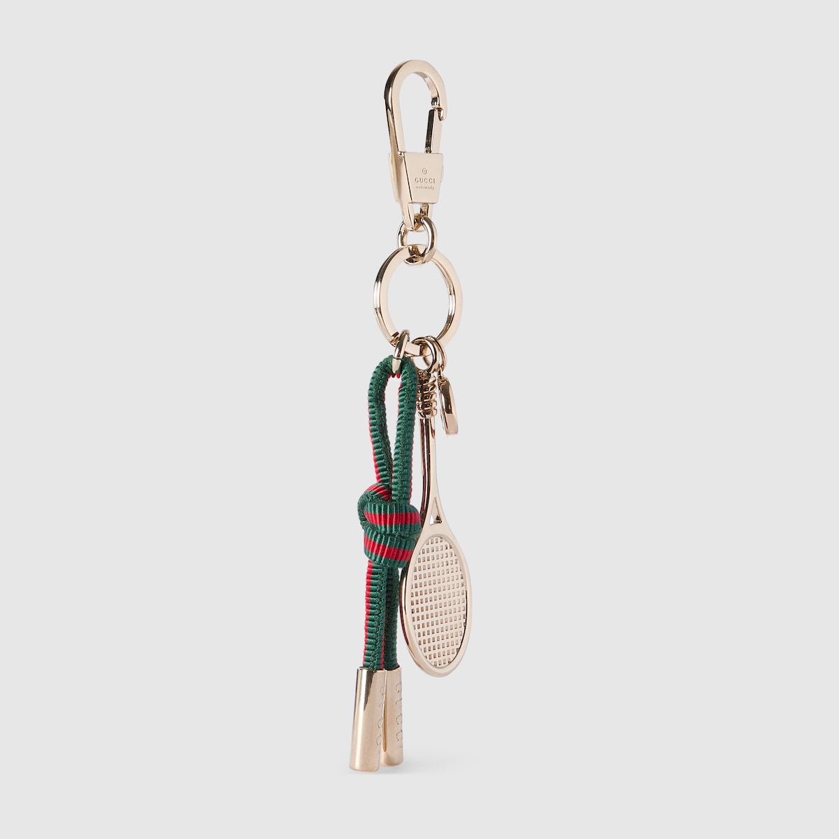 Gucci Tennis keychain with Web in light gold-toned metal | GUCCI® US