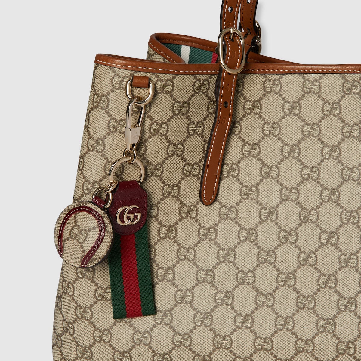 Gucci Tennis keychain with Web in beige and brown GG fabric | GUCCI® US