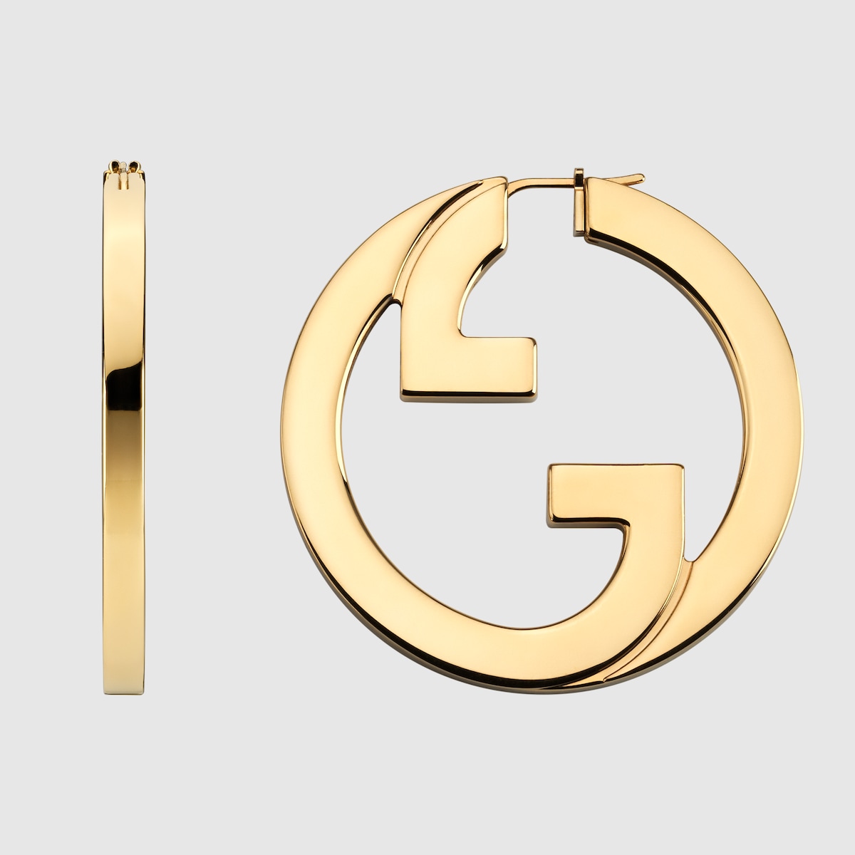 Gucci Blondie cut-out hoop earrings in light gold-toned aluminium ...